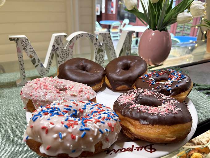 Donut nirvana achieved &ndash; chocolate, sprinkles, and frosting creating a sweet symphony of breakfast rebellion.