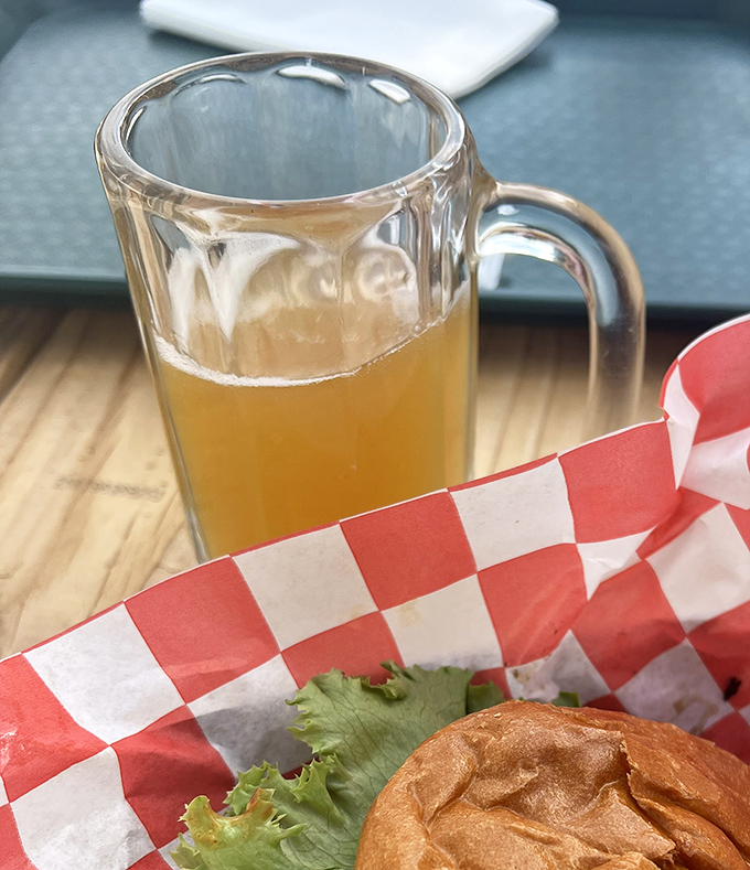 The perfect pairing: a cold drink and a burger on red-checkered paper. Some combinations are just written in the stars.