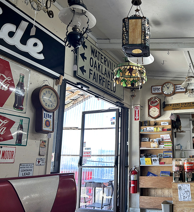 Even the exit is an exhibit! Vintage signs and Tiffany-style lamps transform a doorway into another collecting opportunity.