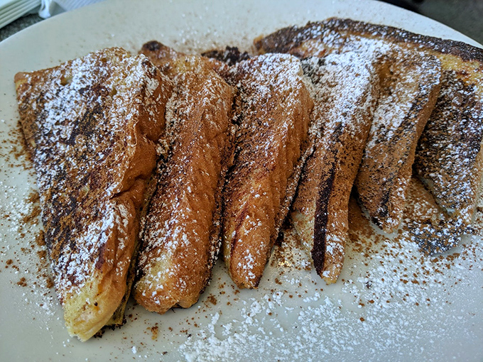 French toast dusted with cinnamon and powdered sugar&mdash;breakfast or dessert? Why choose when you can have both?