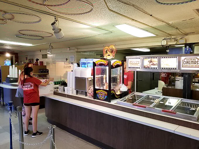 Inside this time capsule of cinema snacks, the popcorn smells exactly like your childhood memories said it would.