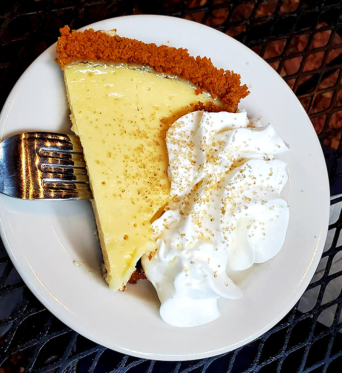 Key lime pie that strikes that perfect balance between tart and sweet—like a sunny day with just enough breeze to keep you comfortable.