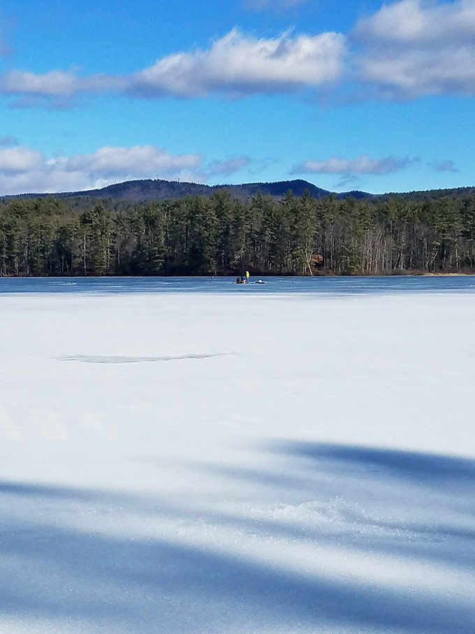 Winter transforms Otter Lake into nature's skating rink. The brave ice fishers in the distance clearly didn't get the "hibernation" memo.
