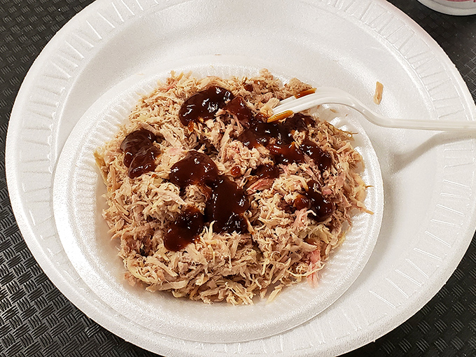 Chopped pork with sauce drizzled like abstract art &ndash; a masterpiece that belongs in the Museum of Southern Culinary Treasures.