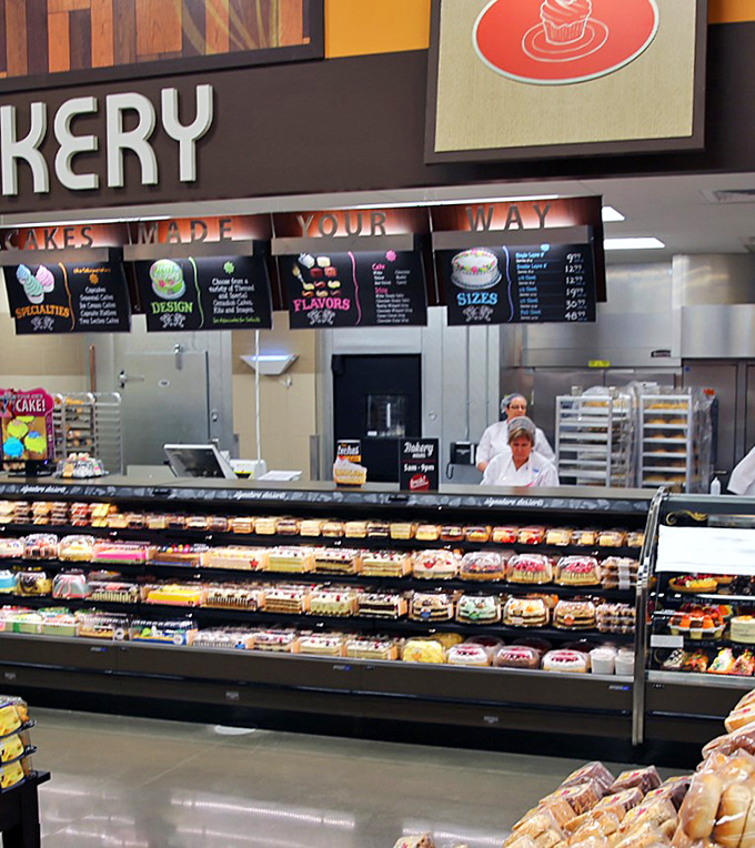 The bakery counter, where resistance is futile. Those donuts have your name on them, and the staff knows you're already calculating the calories.