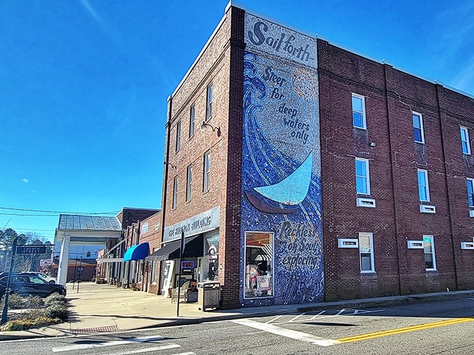 That stunning mural says it all: "Sail forth, steer for deep waters only." In Mathews, even the buildings remind you to live boldly.