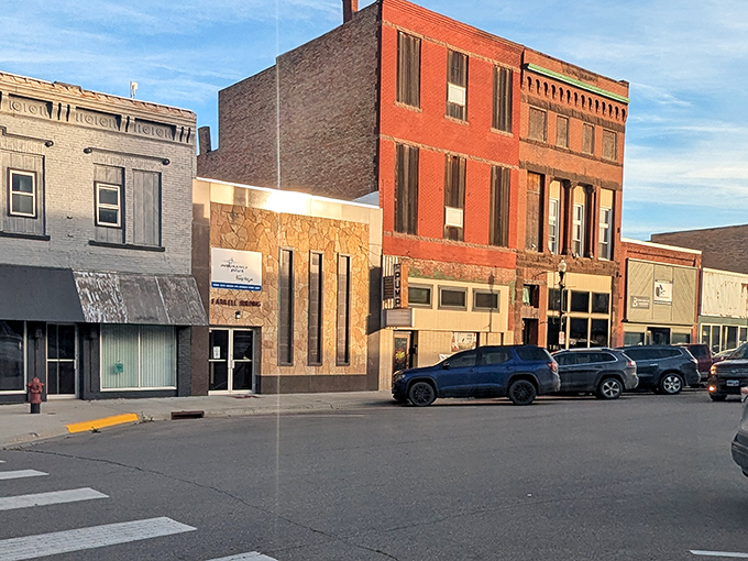 Sunset casts golden light on Milbank's historic buildings, transforming ordinary brick into architectural treasure.