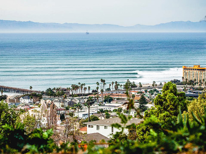Ventura's coastline curves gracefully toward the horizon, where beach living meets small-city convenience in perfect harmony.