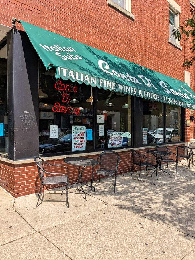 Conte Di Savoia's emerald awning shelters sidewalk tables perfect for people-watching with your Italian sub.