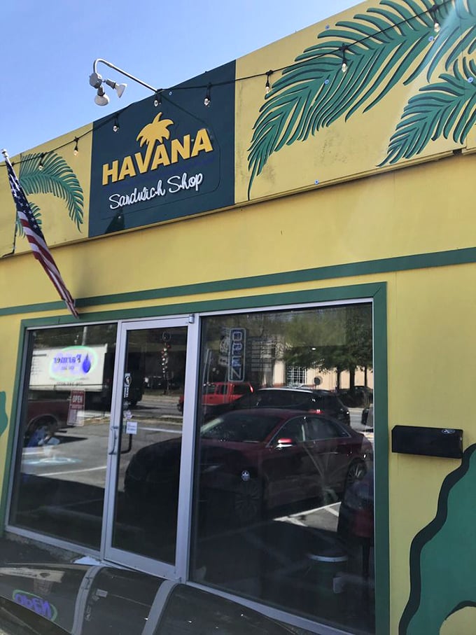 Those tropical palm trees and sunny yellow walls transport you to Havana faster than any airplane.