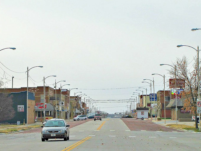 Main Street, Hoisington—where rush hour means three cars at the four-way stop. Small-town simplicity at its most authentic.
