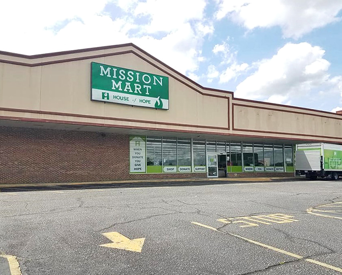 Mission Mart's bold green sign beckons like a lighthouse for the budget-conscious, guiding shoppers to shores of incredible bargains.