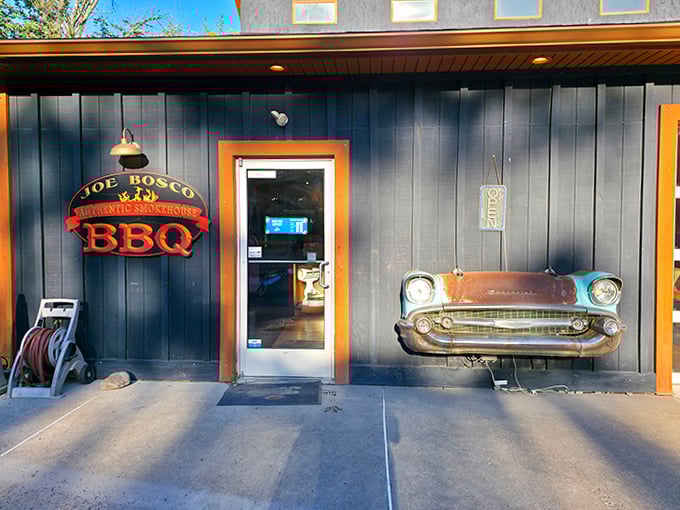 That vintage car front embedded in Joe Bosco's wall tells you this place has personality&mdash;and their BBQ has just as much character.