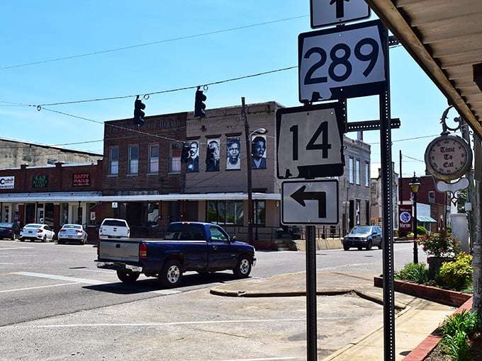 Downtown streets showcase faces of the past watching over modern life in this musical Alabama treasure.