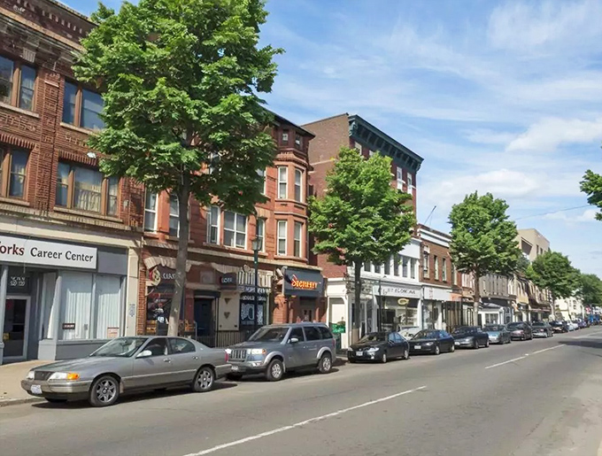 Meriden's town square offers a peaceful oasis amid historic brick buildings, proving that the best town centers are designed for people, not parking.