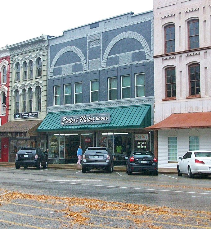 Historic storefronts line downtown Paris, Tennessee, where charming local businesses thrive in beautifully preserved buildings.
