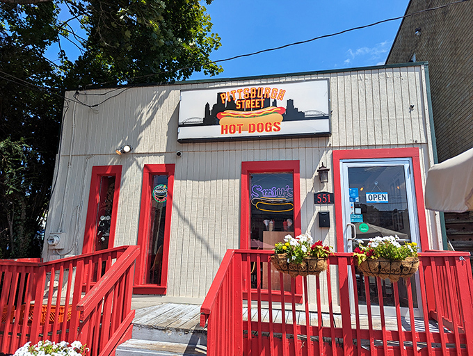 Pittsburgh Street Dogs' bright red railing welcomes you like an old friend &ndash; one who happens to make incredible hot dogs.