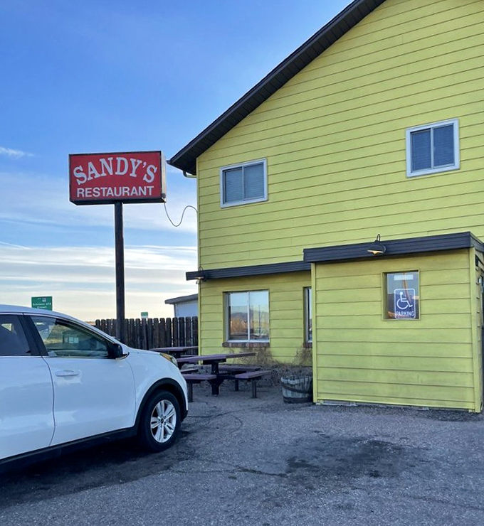 No frills, just thrills! This sunshine-yellow building houses breakfast magic that won't empty your wallet