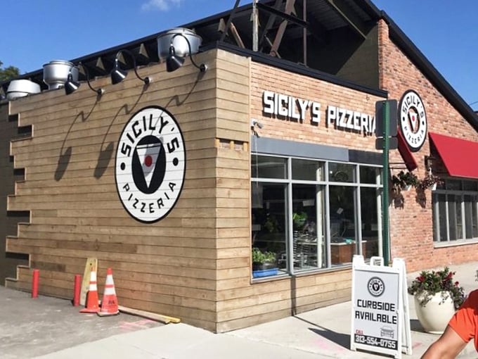 Sicily's corner location with its wooden accents feels like the neighborhood pizza joint every community deserves.