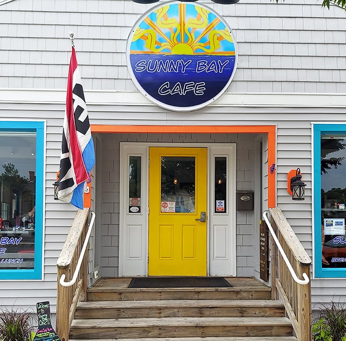 Sunny Bay's cheerful yellow door is like a smile greeting you before the first cup of coffee.