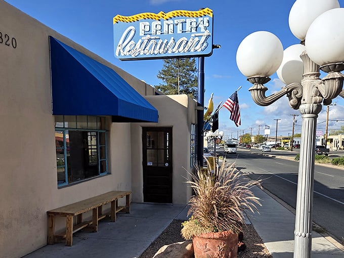 That blue and white sign has guided hungry souls for decades. In Santa Fe's sea of adobe, The Pantry stands out by simply standing firm.
