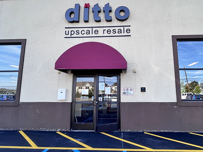 That purple awning signals upscale resale where designer dreams meet surprisingly affordable price tags.