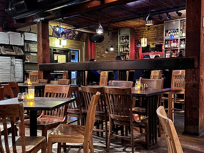 Inside this hidden gem, wooden tables and moody lighting set the stage for pizza that's worth keeping secret from your friends.