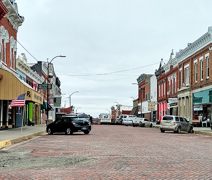 Bedford's classic brick buildings frame a street that's seen horse-drawn carriages and Teslas alike. Some things change, but good architecture stands the test of time.