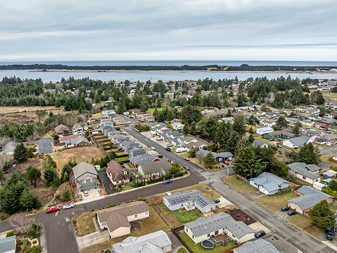 Coos Bay's neighborhoods spread toward the Pacific, where morning fog and ocean breezes are part of daily life.