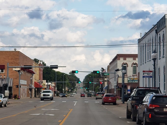 Rain-slicked streets reflect Crete's historic architecture, where affordable living meets small college town atmosphere.