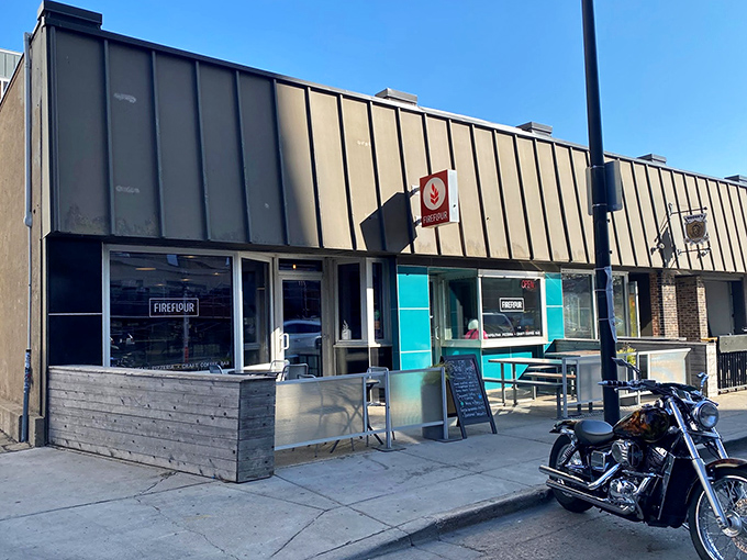 That simple red logo marks the spot where pizza purists find Neapolitan nirvana in the heart of Bismarck.