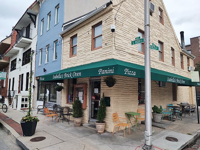 Those colorful chairs aren't just for sitting&mdash;they're front-row seats to Baltimore's brick oven pizza theater at its finest.