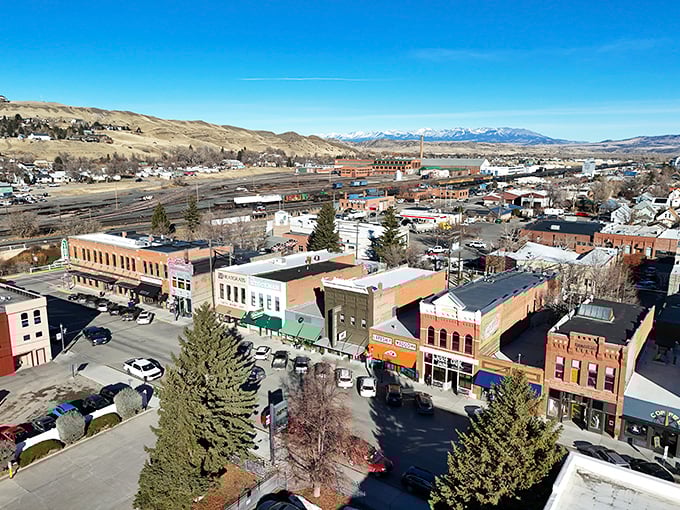 A bird's eye view of Livingston reveals a patchwork of historic buildings nestled against Montana's magnificent mountain ranges.