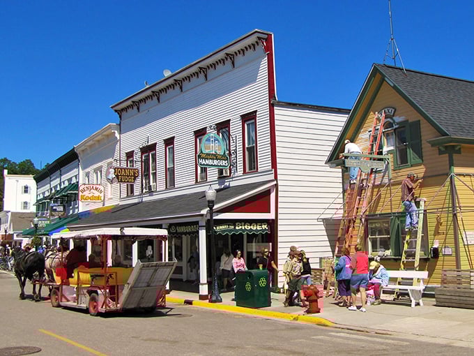 Mackinac Island's historic buildings house fudge shops and boutiques where the only traffic jam involves horses and bicycles.