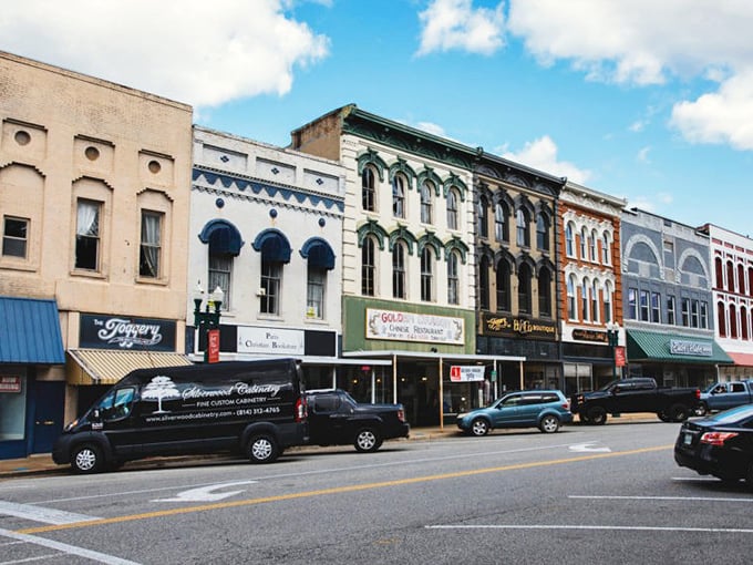 Historic buildings in Paris house local businesses where shop owners might become neighbors in your affordable apartment nearby.