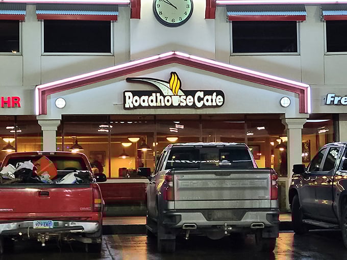Rain or shine, the Roadhouse Cafe's illuminated sign guides hungry travelers like a lighthouse for those lost in a sea of fast food.