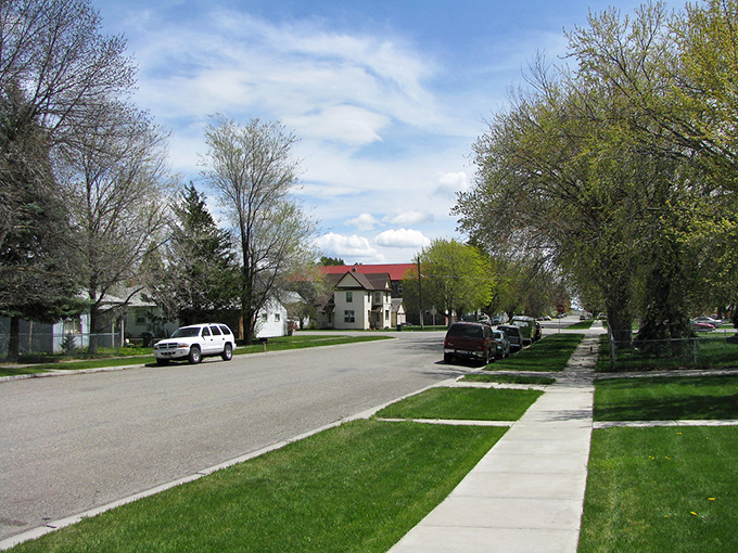 Quiet residential streets where children can still ride bikes without parental GPS tracking systems.