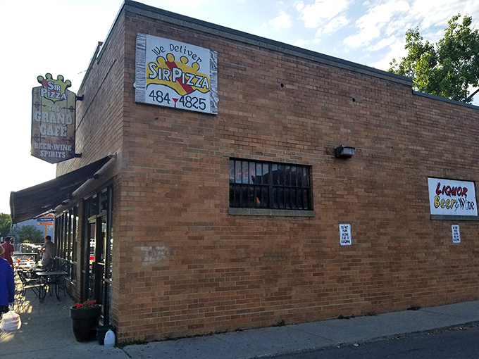 The unassuming back entrance proves Sir Pizza doesn't need flashy signage when locals already know where the good stuff is.