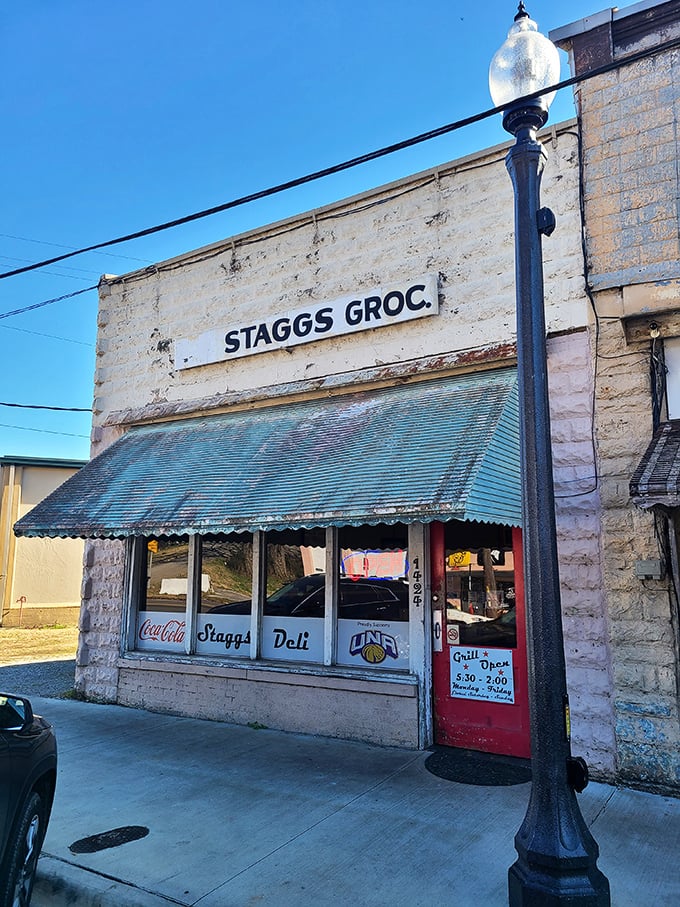That vintage awning and classic storefront aren't retro design choices&mdash;they're authentic pieces of burger history.