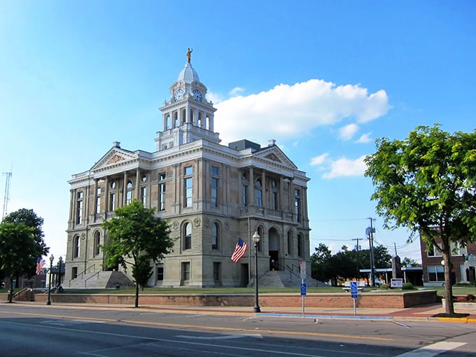 The historic Fayette County Courthouse stands proudly under blue skies in Washington Court House, Ohio.