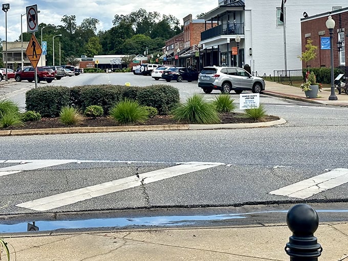 The town square's gentle curve invites exploration, with each storefront promising its own chapter in Monroeville's continuing story.