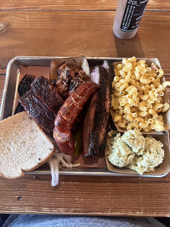 A barbecue platter that should come with its own theme music. This isn't just dinner—it's a meat masterpiece worthy of its own museum.