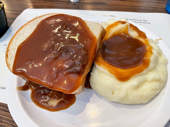 Hot roast beef sandwich with gravy cascading over homemade bread and mashed potatoes &ndash; the kind of plate that makes you want to write thank-you notes to farmers.