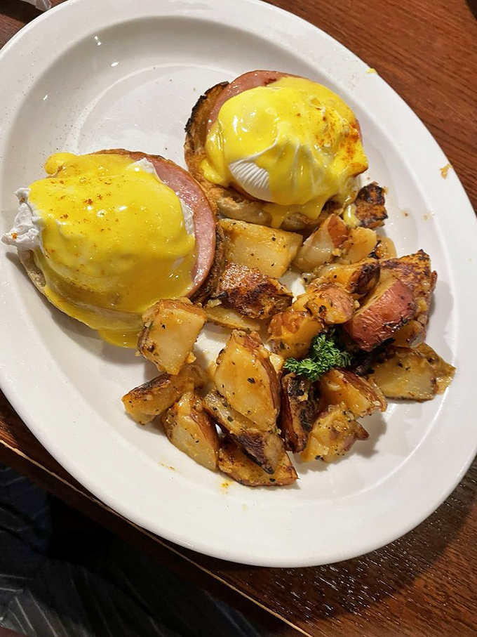 Eggs Benedict done right &ndash; with hollandaise that cascades down like a yellow waterfall of buttery goodness.