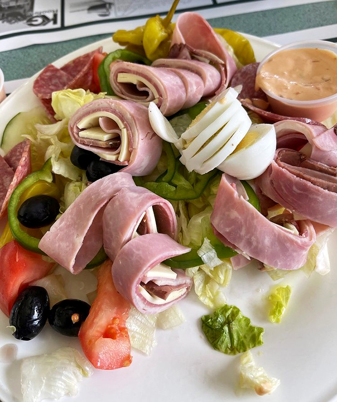 A chef's salad that doesn't apologize for being exactly what it is &ndash; a beautiful arrangement of deli meats, cheese, and vegetables that satisfies without pretension.