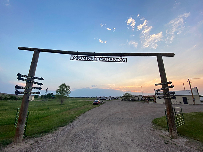 Pioneer Crossing's rustic entrance arch welcomes modern-day travelers just as the landmark welcomed westward-bound settlers&mdash;minus the dysentery and broken wagon axles.
