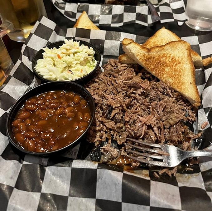 When chopped beef comes with beans this saucy and slaw this fresh, you know you're experiencing barbecue that respects the classics.