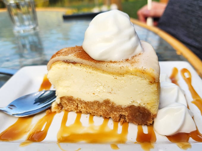 Cheesecake that makes you forget your diet resolutions faster than you can say "just a small slice." The caramel drizzle is nature's way of saying "resistance is futile."