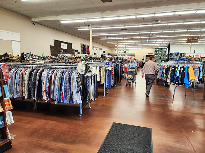 The men's clothing section stretches into the distance like a fabric ocean, where yesterday's fashion becomes tomorrow's vintage find.