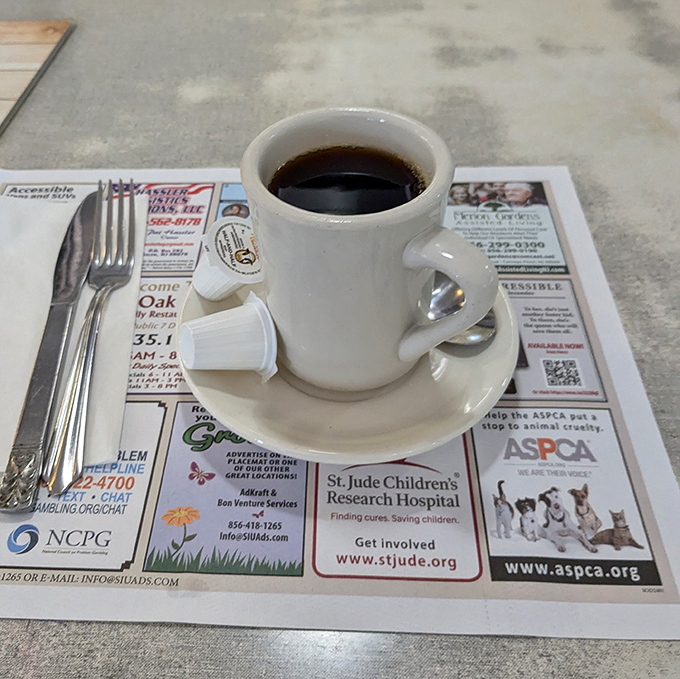 The humble diner coffee cup &ndash; unassuming white ceramic that's witnessed first dates, business deals, and the quiet contemplation of life's great mysteries.